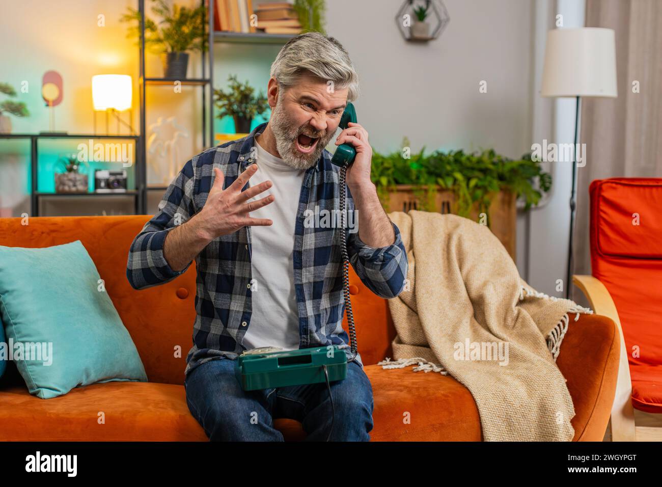 Telephone helpline elderly hi-res stock photography and images - Alamy