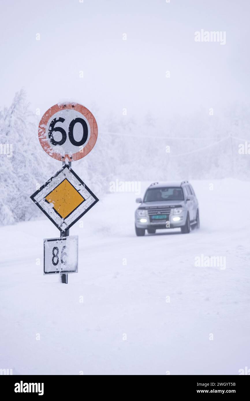 4x4 Vehicle passing a 60 kmph and Priority road roadsigns in Freezing ...