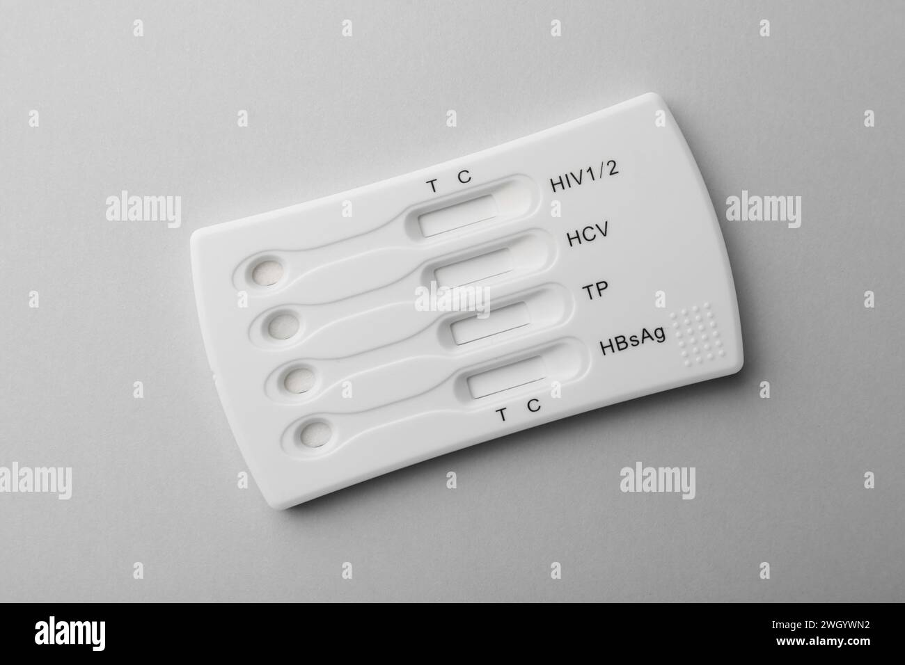 Disposable multi-infection express test on light grey background, top ...
