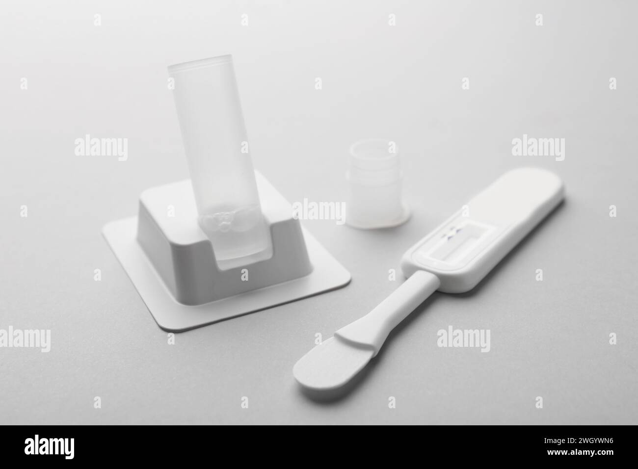 Disposable express test kit on light grey background Stock Photo - Alamy