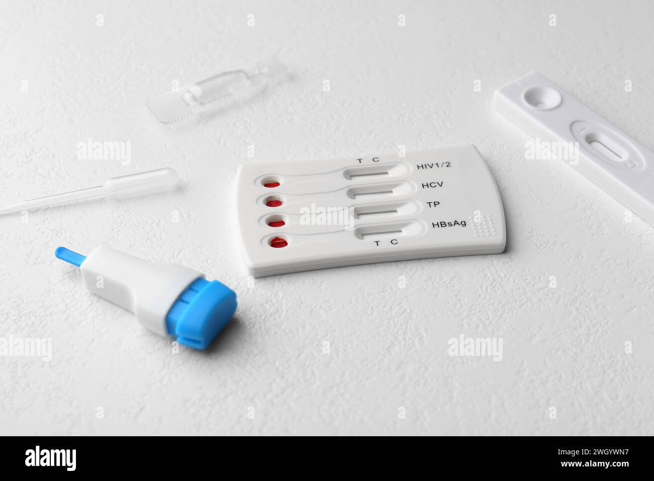 Disposable express test kit on white table Stock Photo - Alamy