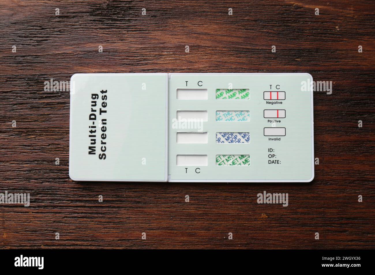 Multi-drug screen test on wooden table, top view Stock Photo - Alamy