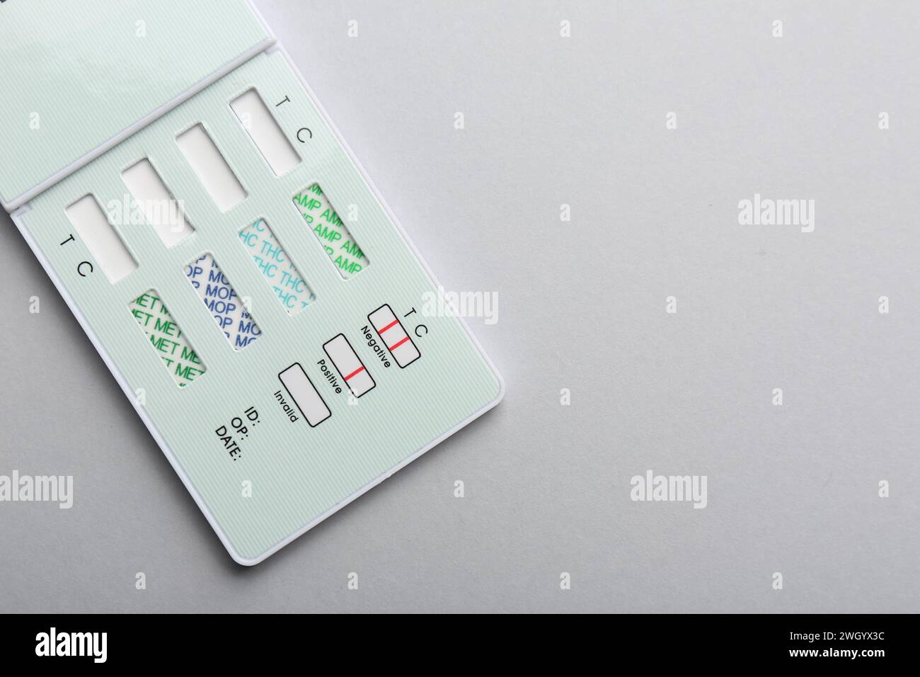 Multi-drug screen test on light grey background, top view. Space for ...