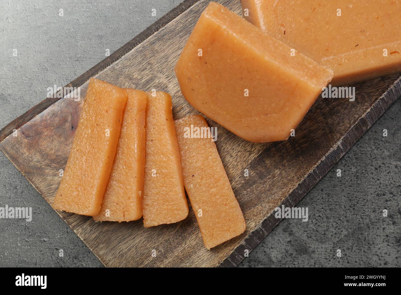Tasty sweet quince paste on grey table, top view Stock Photo - Alamy