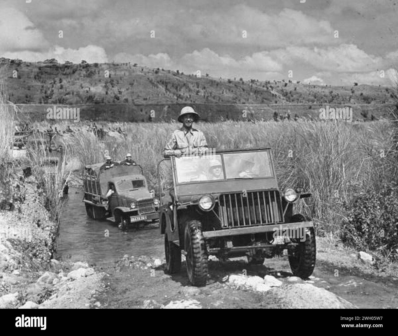 Bantam BRC-40 leading GMC CCKW 2½-ton 6x6 trucks, Philippines, 1941 ...