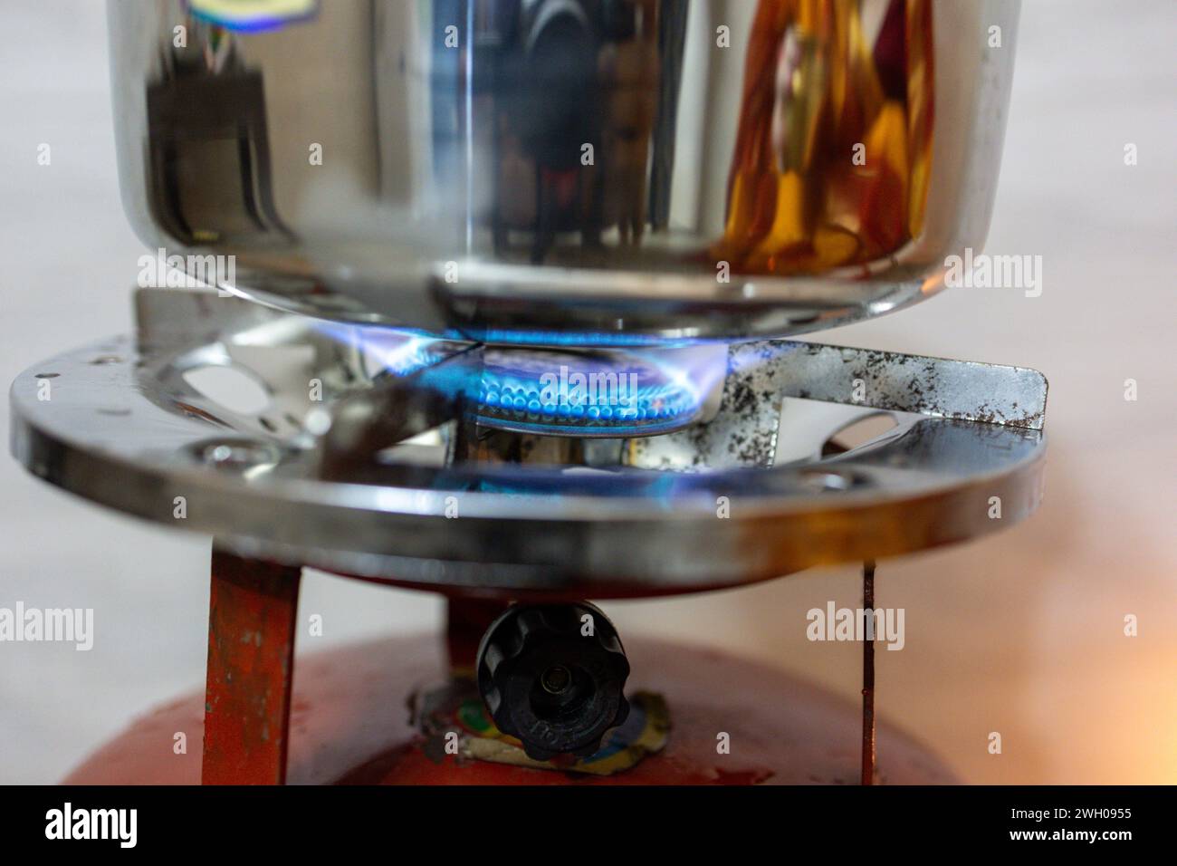 cooking at copper Single Burner Gas Stove at home at day close view ...