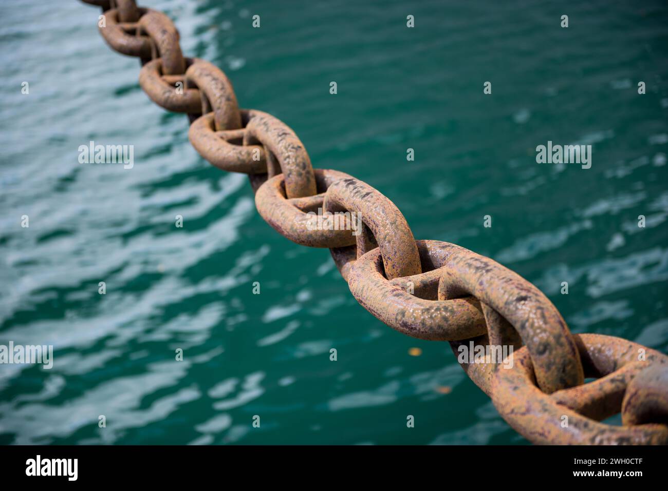 Rusty ship chain anchor in sea water abstract background Stock Photo ...