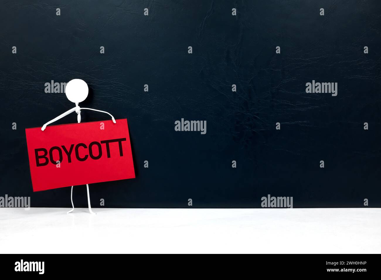 Human stick figure holding red placard with word boycott. Boycotting ...