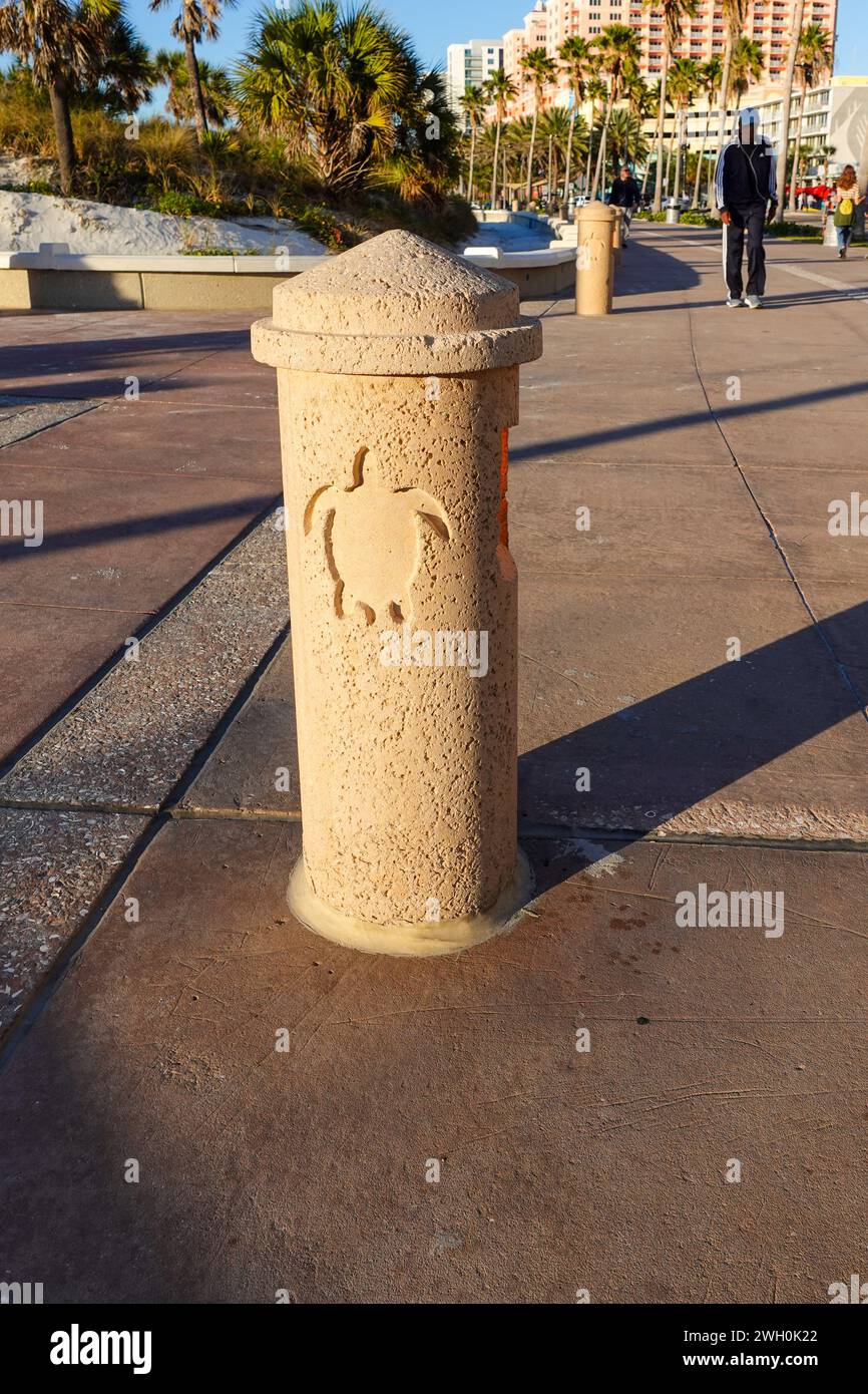 Turtle engraving on a walking path post in Clearwater, Florida Stock ...