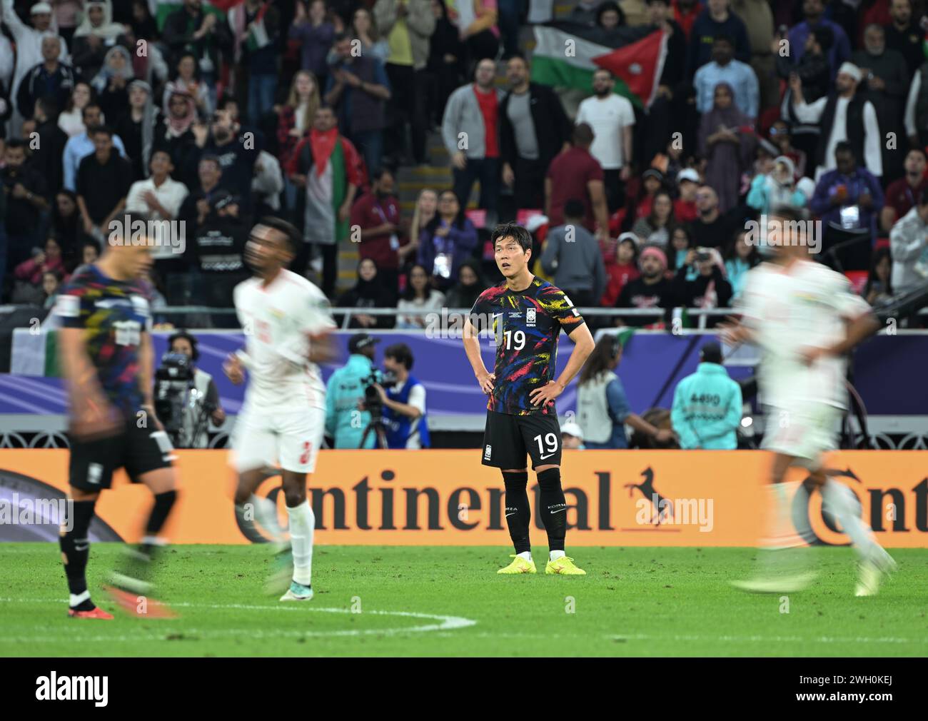 Al Rayyan, Qatar. 6th Feb, 2024. South Korea's Kim Younggwon (2nd R ...