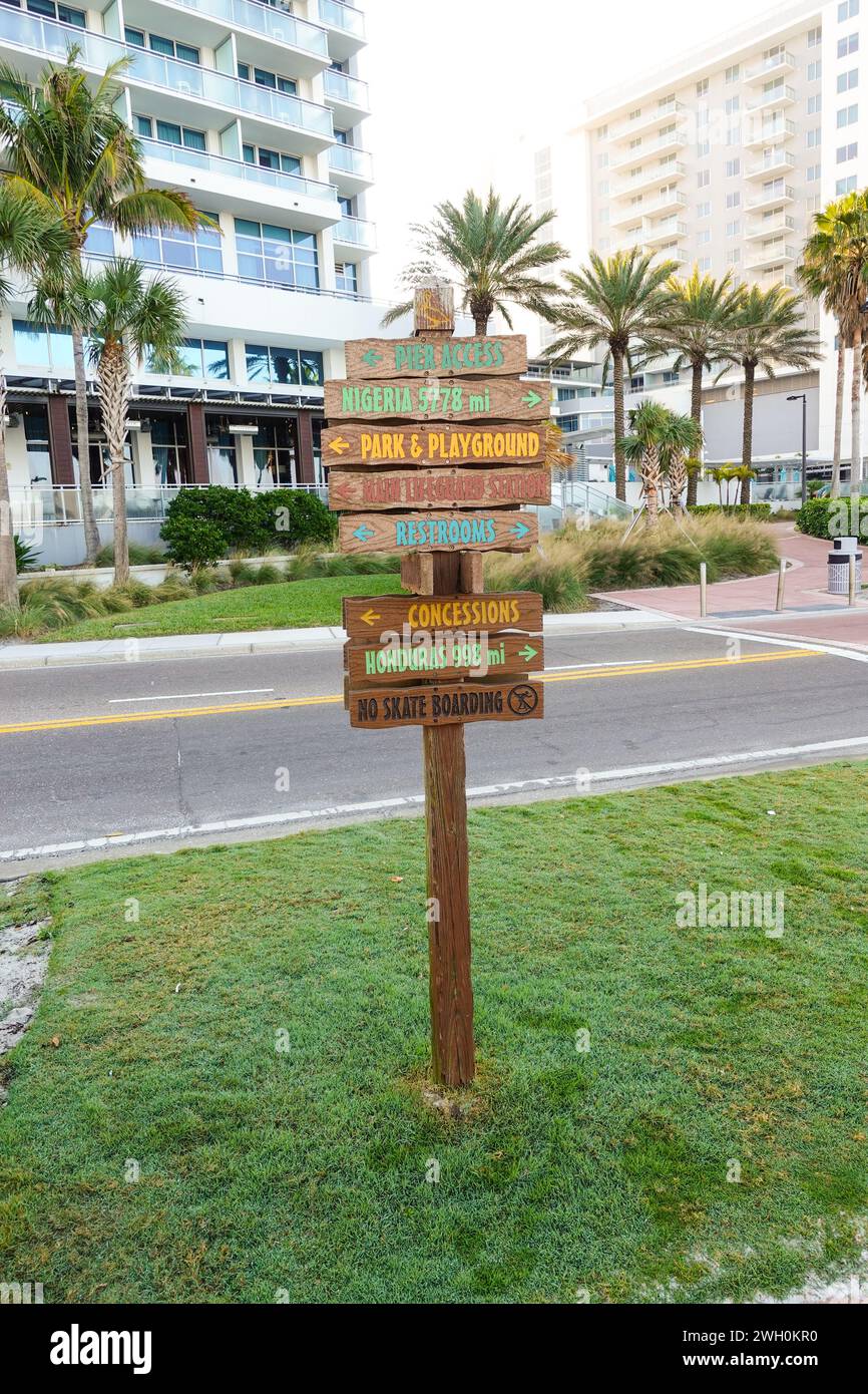 Wooden signpost giving direction to different attractions in Clearwater ...