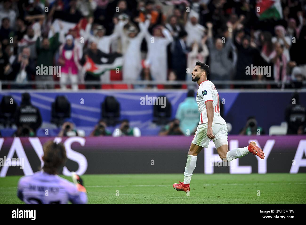 Al Rayyan, Qatar. 6th Feb, 2024. Jordan's Mousa Altamari celebrates ...