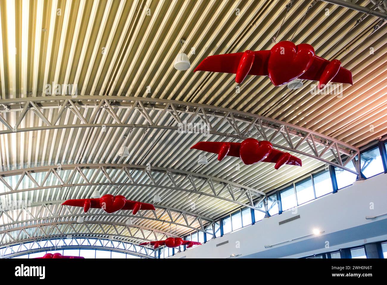 Red airplanes artwork hanging from the ceiling as decoration at Tampa ...