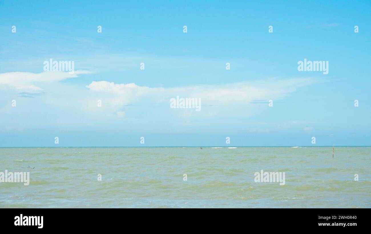 A minimalist and simple image that shows blue skies, trees with a ...