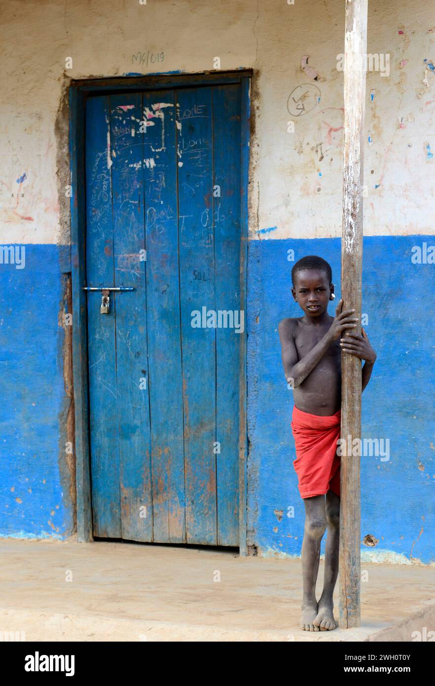 A boy standng outside his house in Ngurunit, North Kenya Stock Photo ...