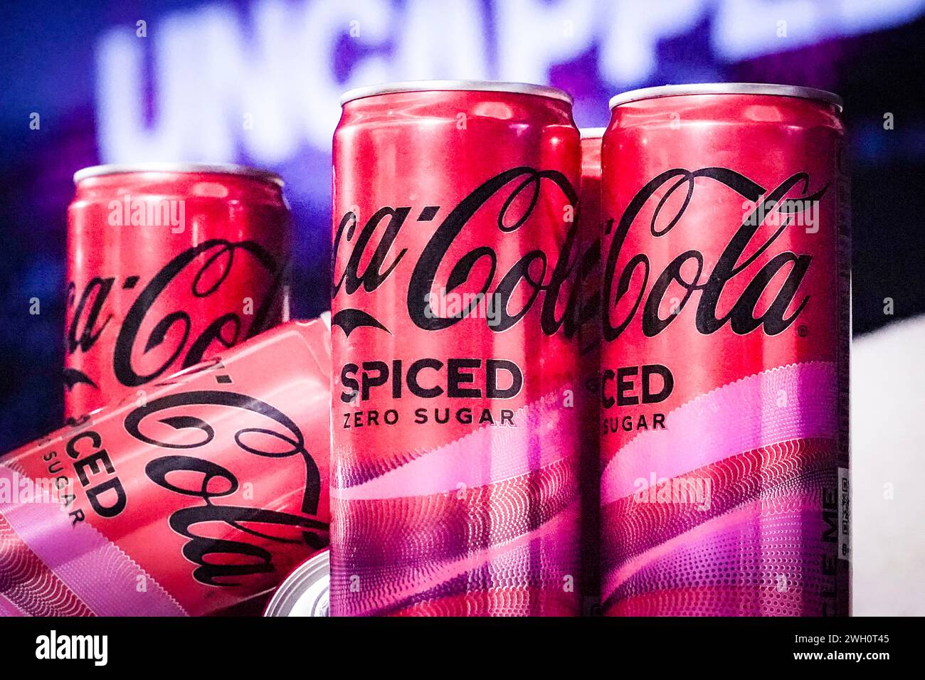 Cans of Coca-Cola Spiced, the beverage company's first new permanent ...