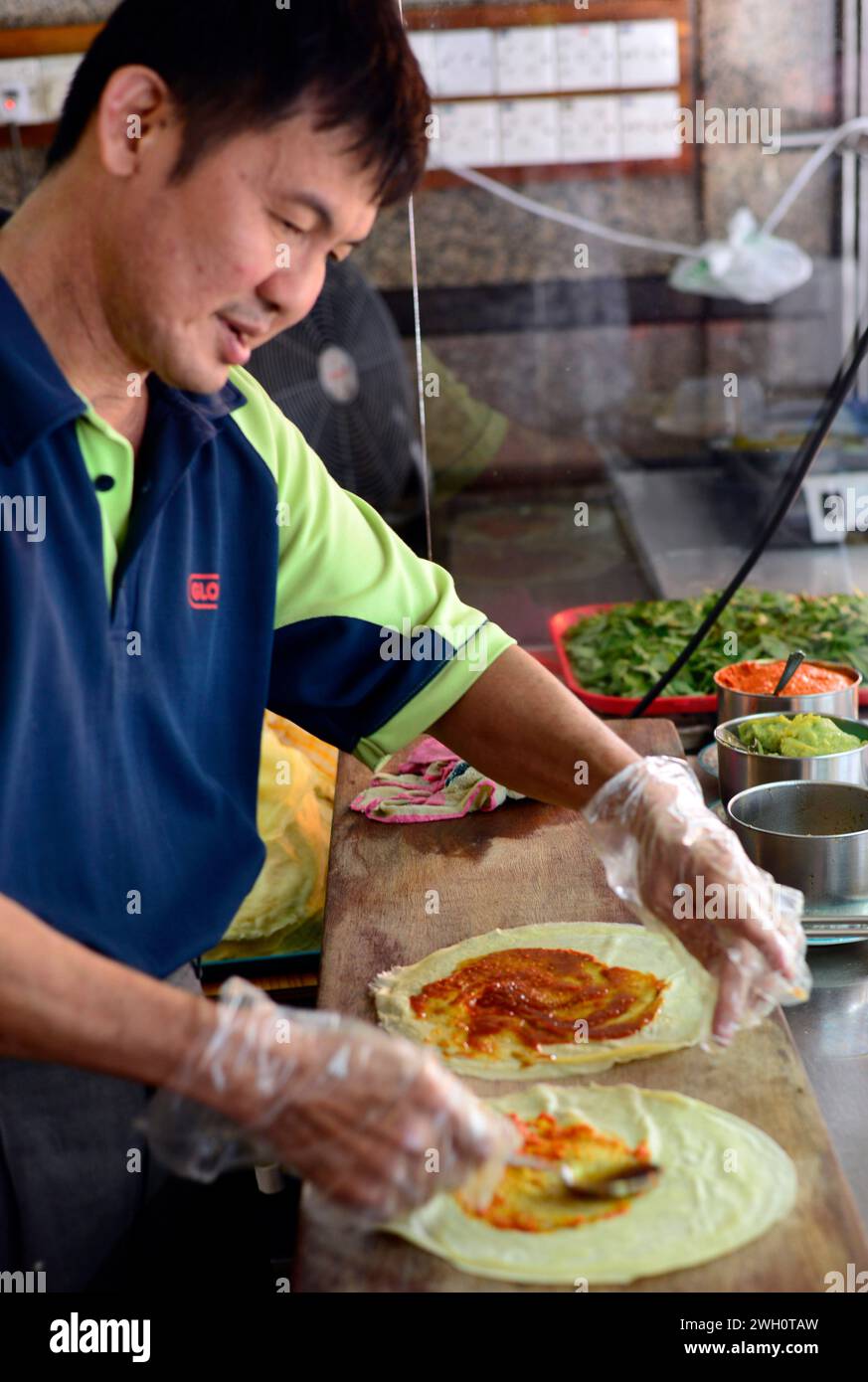 Popiah is a large spring roll popular in Singapore Stock Photo - Alamy
