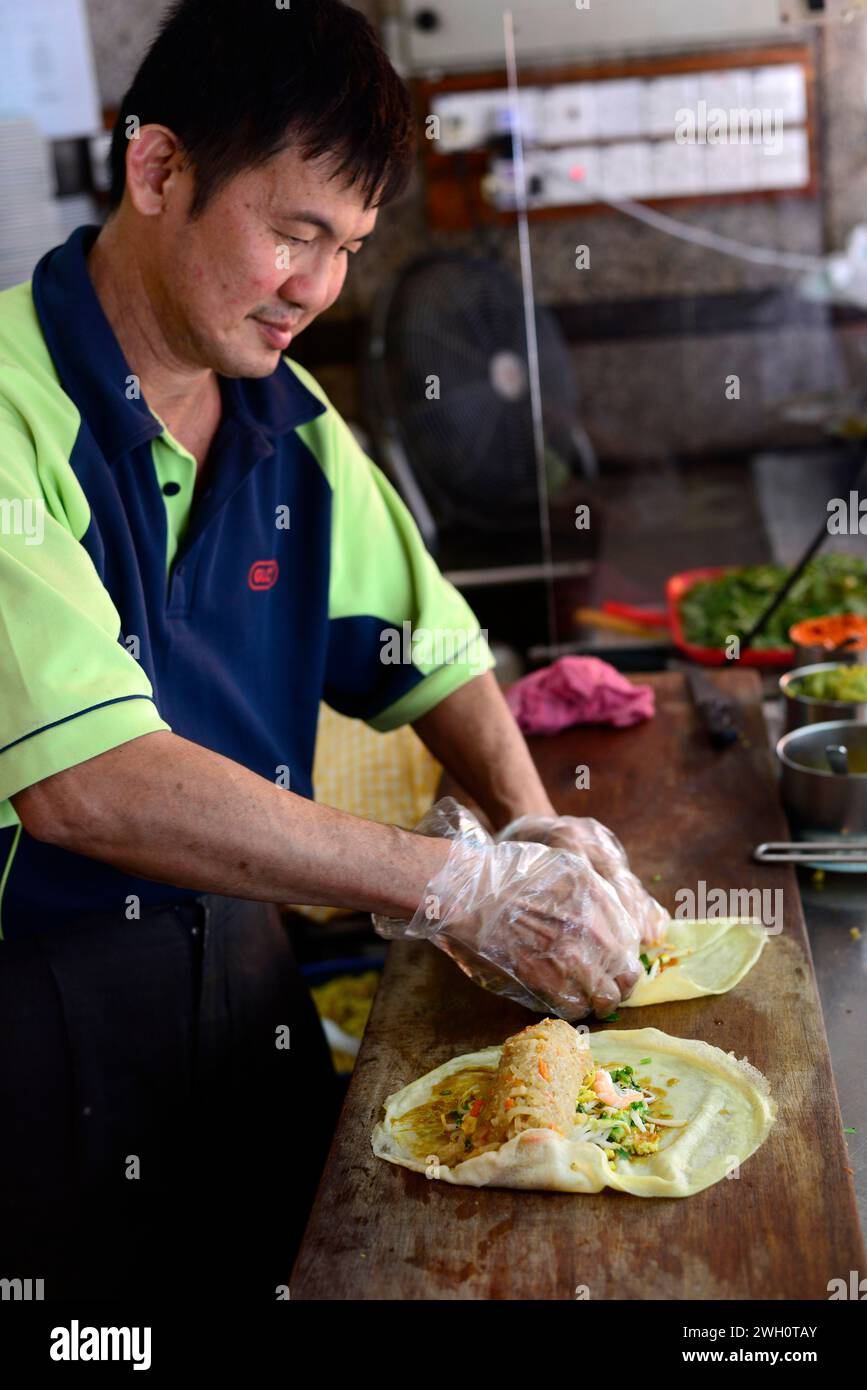 Popiah is a large spring roll popular in Singapore Stock Photo - Alamy