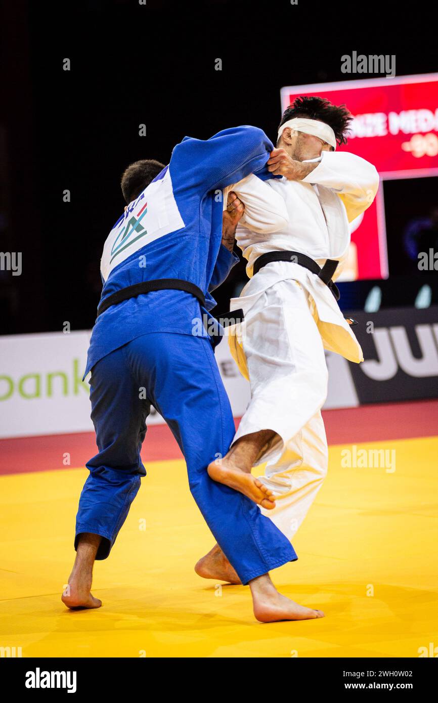 Paris, France. 04th Feb, 2024. Rafael Macedo (blue) of Brazil and Erlan ...