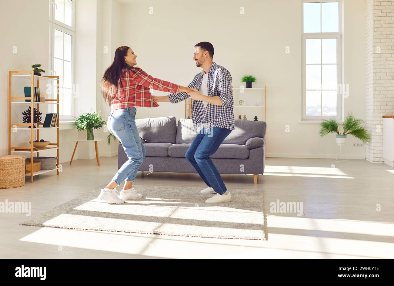 Happy positive caucasian family dance hi-res stock photography and ...