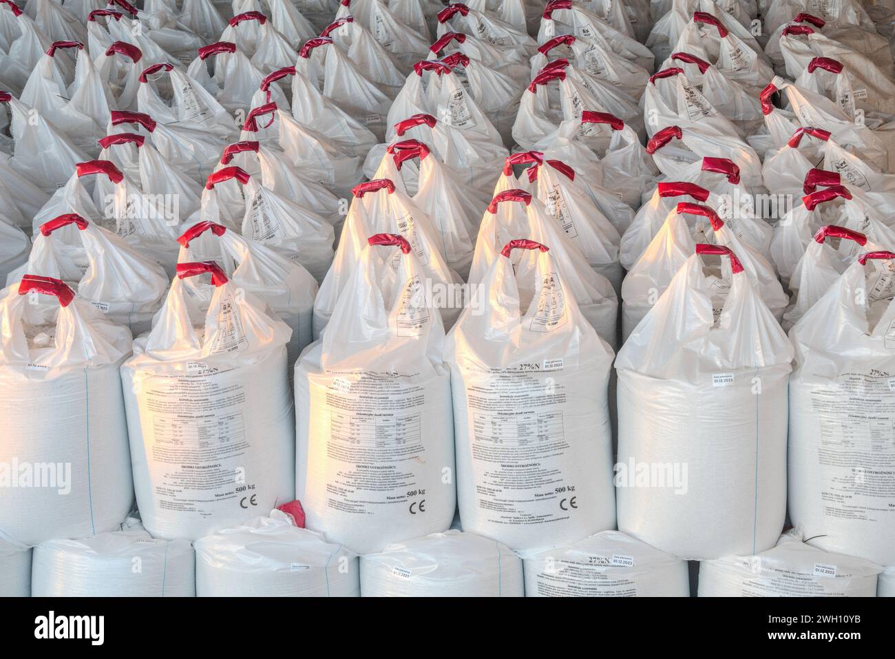 Stack of fertiliser bags in storage Stock Photo - Alamy