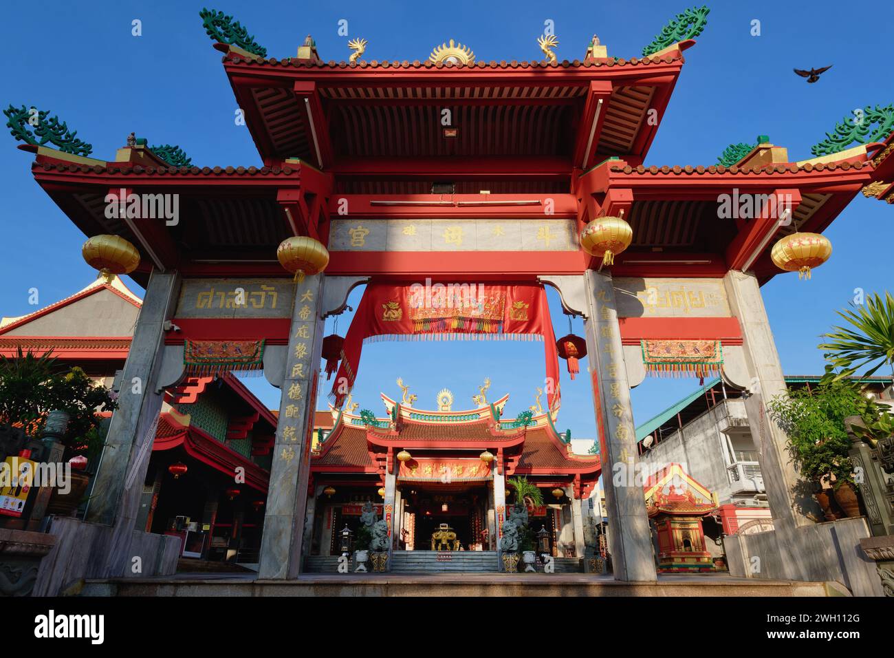 The ornate entrance gate to Jui Tui Temple (temple in b/g), a landmark ...
