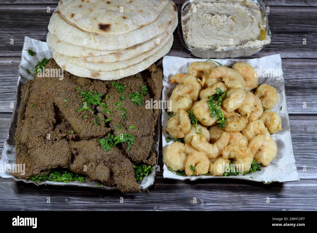 Traditional Arabic deep fried beef liver slices, beef liver covered ...