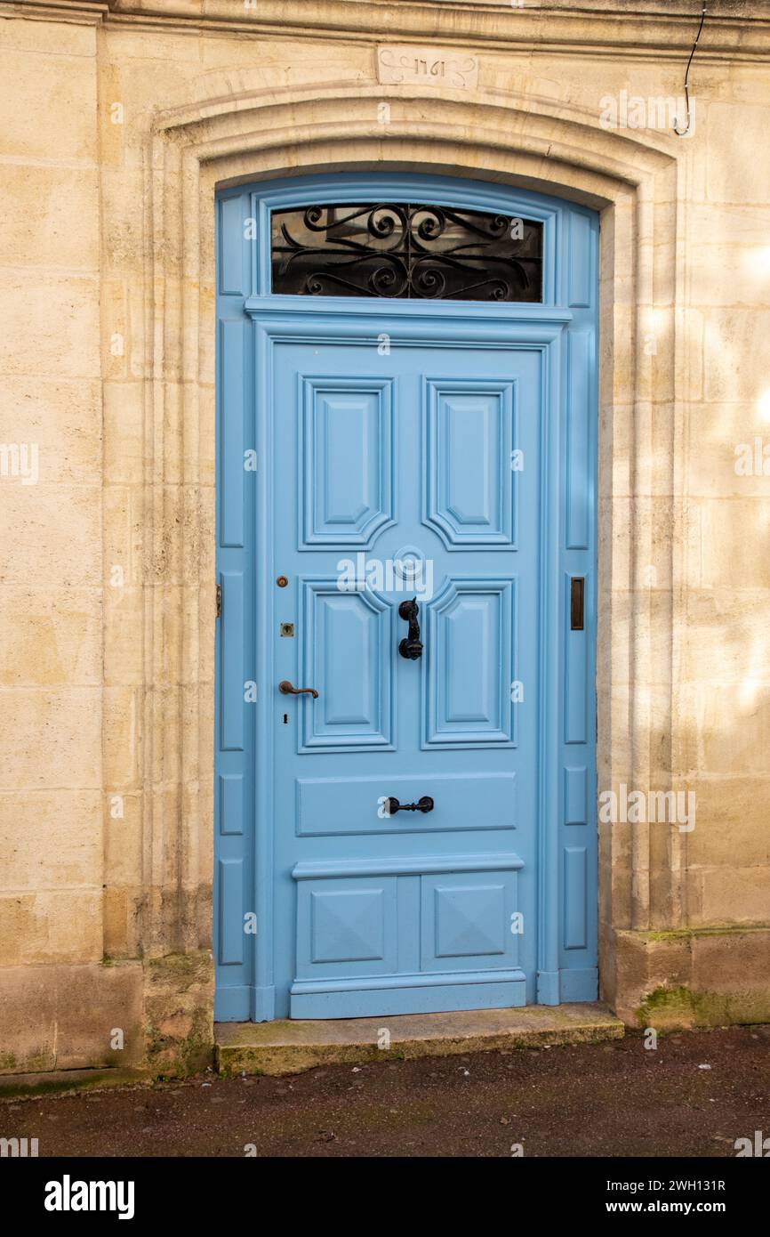 Blue French door wooden traditional european entrance to a private ...