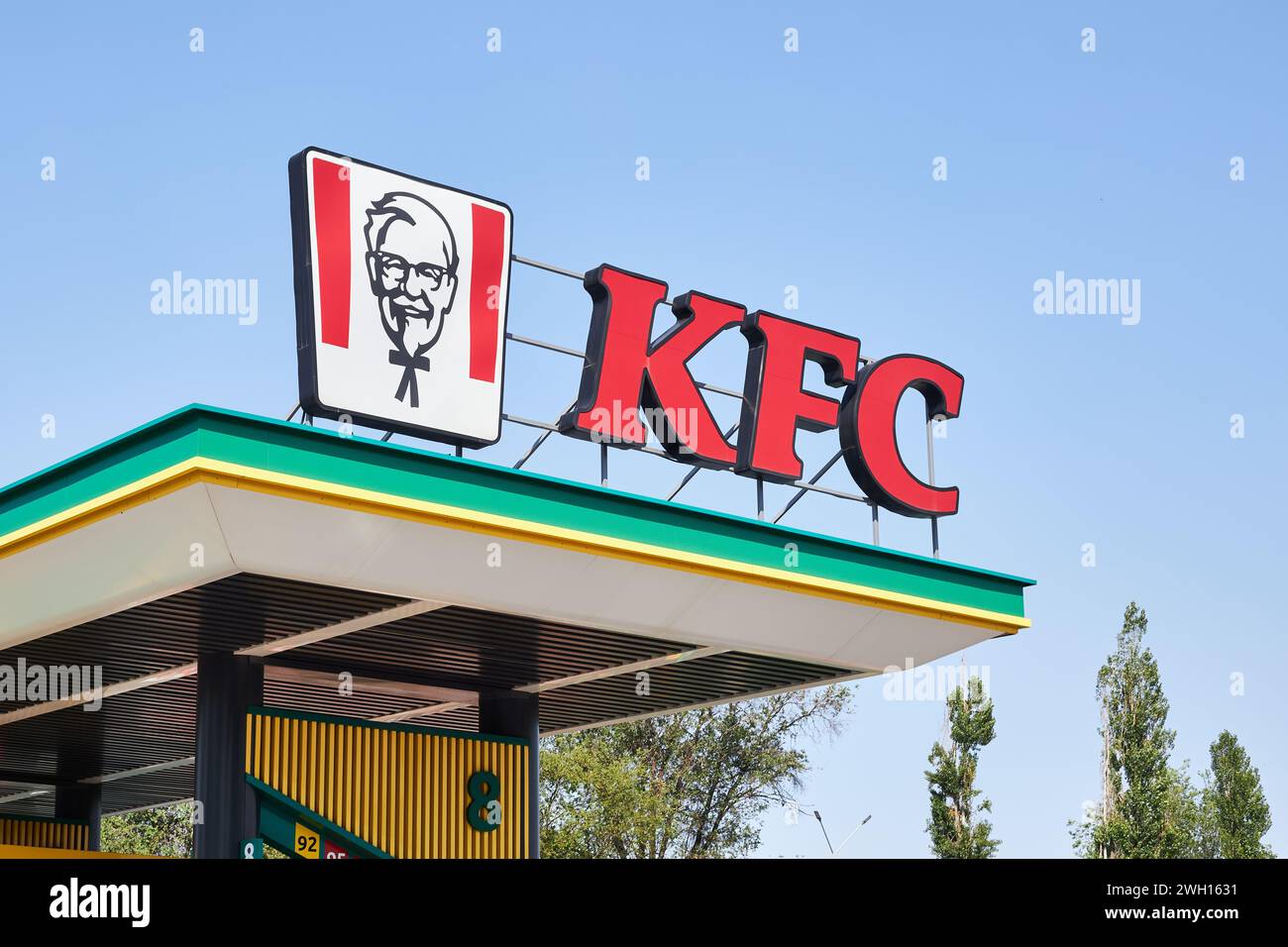 KFC Colonel Sanders logo on roof of gas station. Kentucky Fried Chicken ...