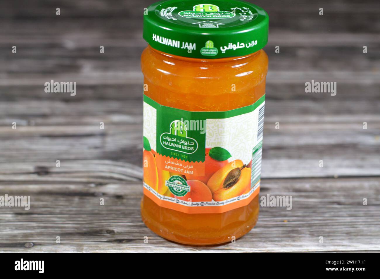 Cairo, Egypt, February 4 2024: Halwani Bros apricot jam Haalwani bottle ...