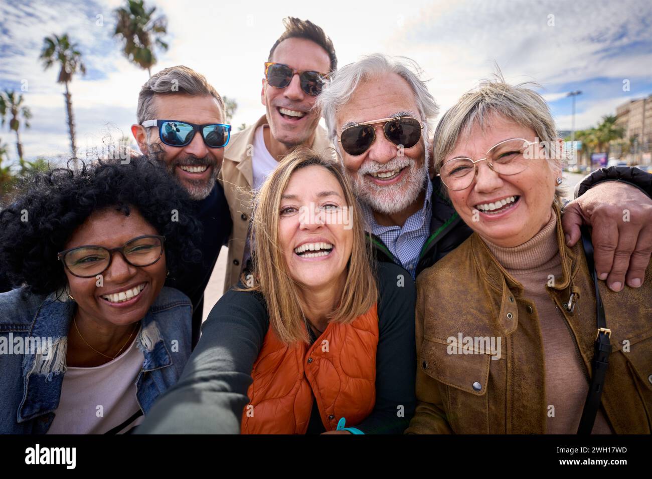 Group diverse cheerful middle-aged tourist friends posing smiling ...