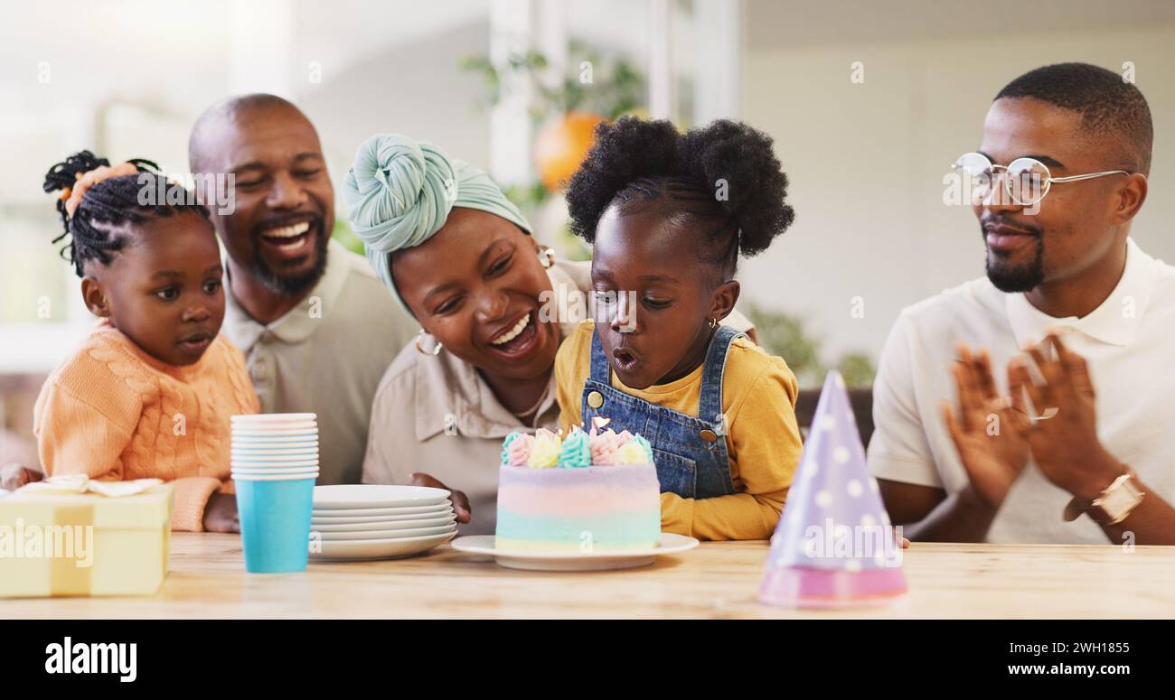 Birthday, children party and applause with a family in celebration of a ...