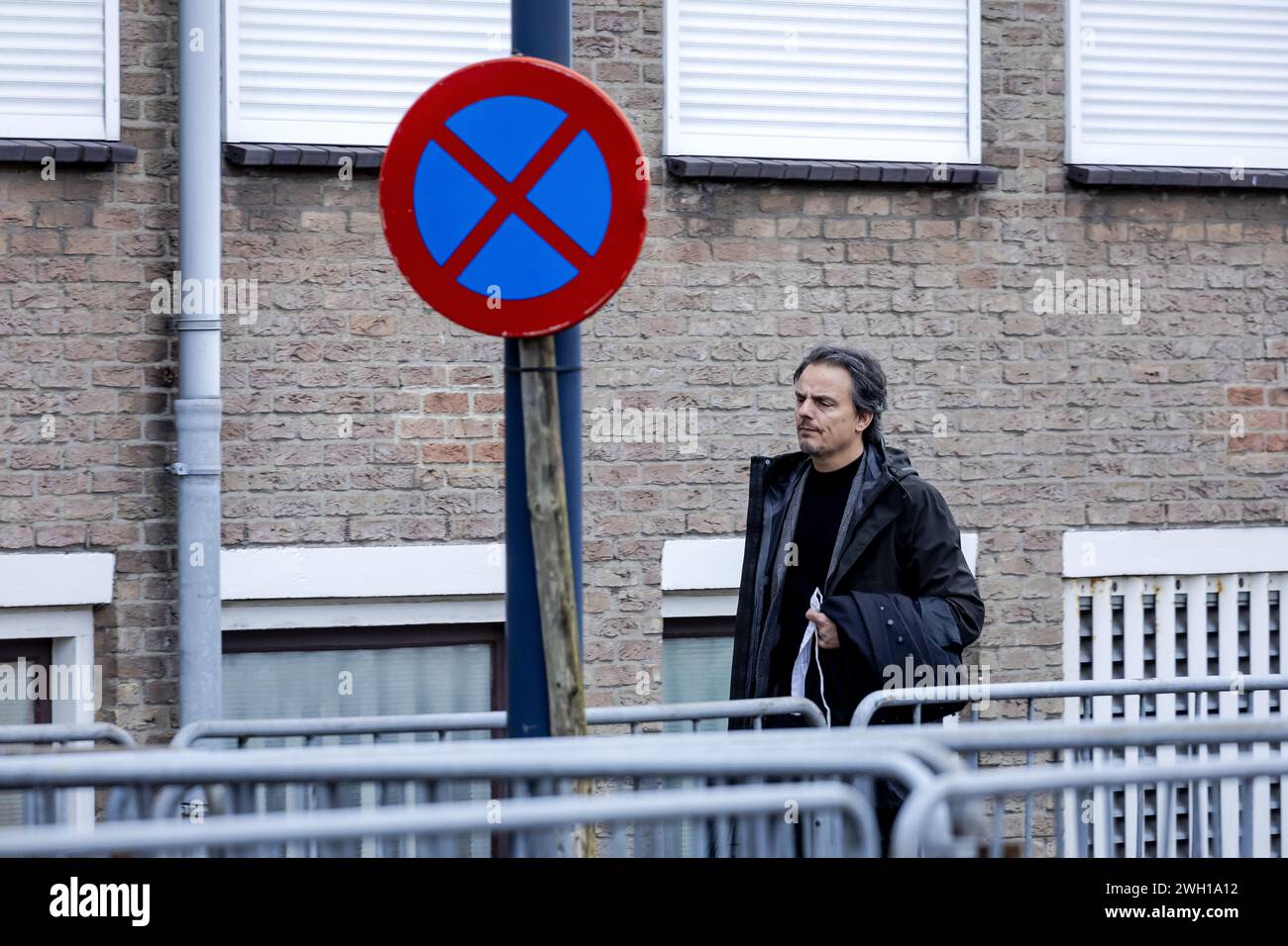 AMSTERDAM - Lawyer Ruud van Boom arrives at the extra-secure court ...
