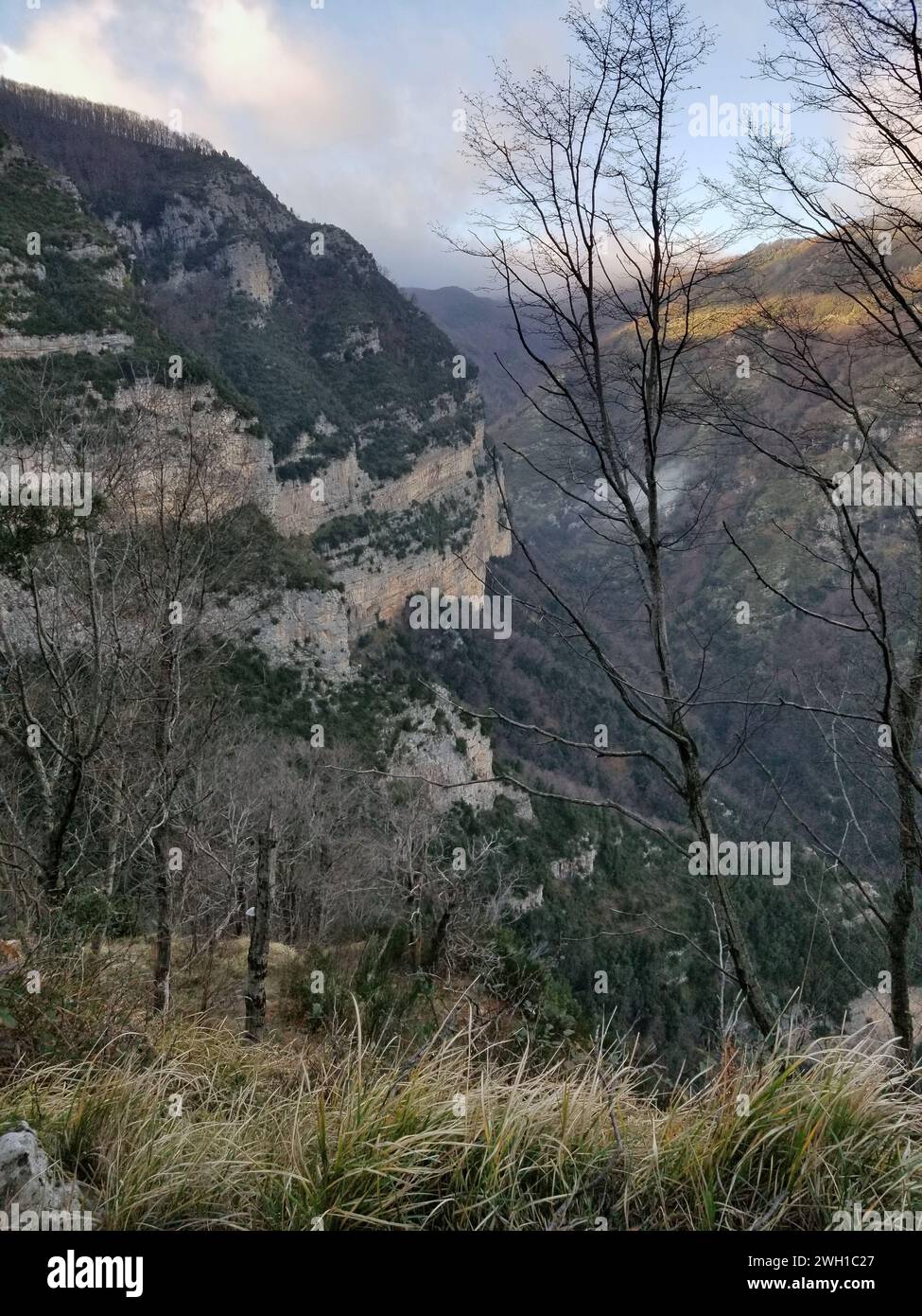 Mountain and steep cliff with fog, mountains between Agerola and Amalfi ...