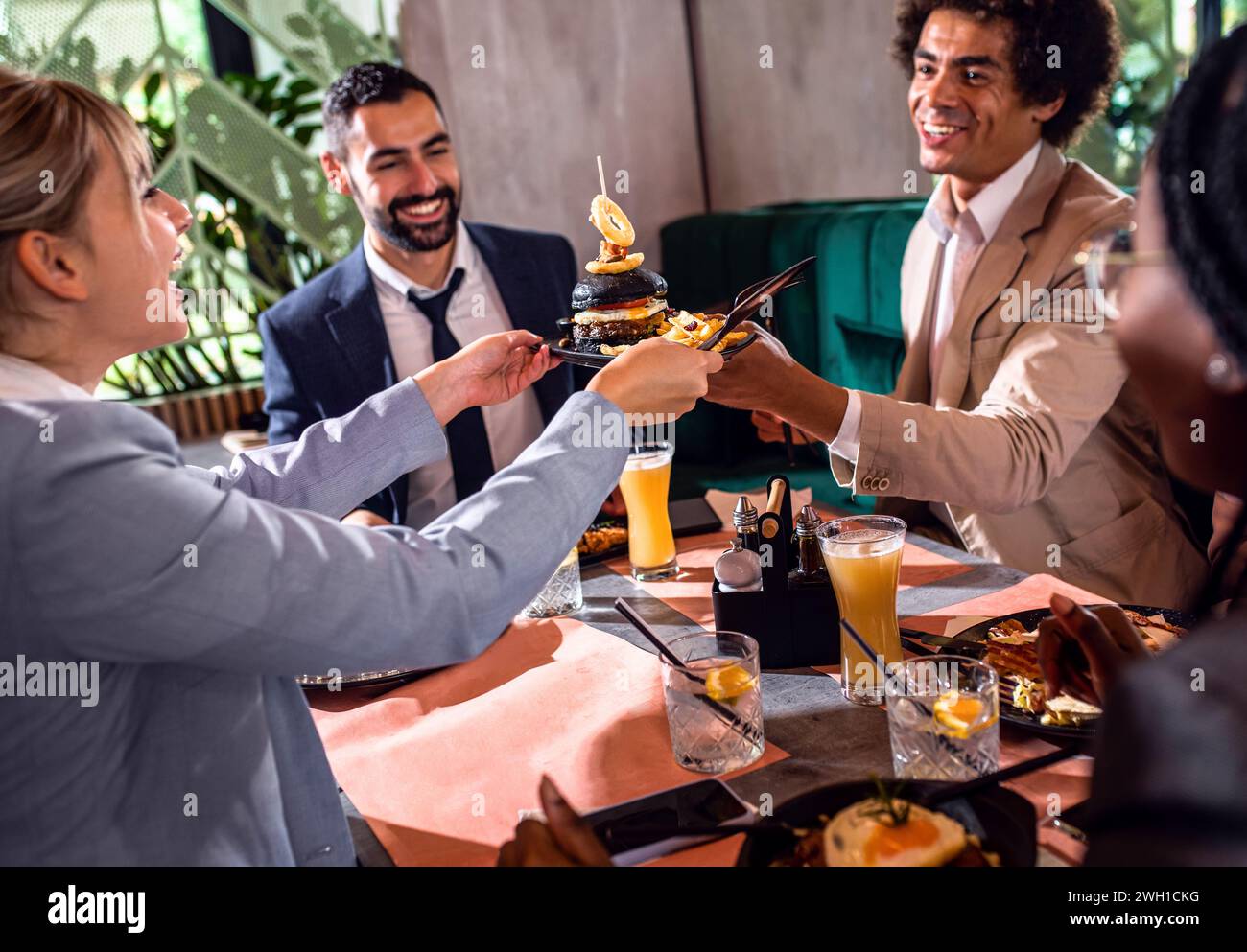 Business team working lunch eating hi-res stock photography and images ...