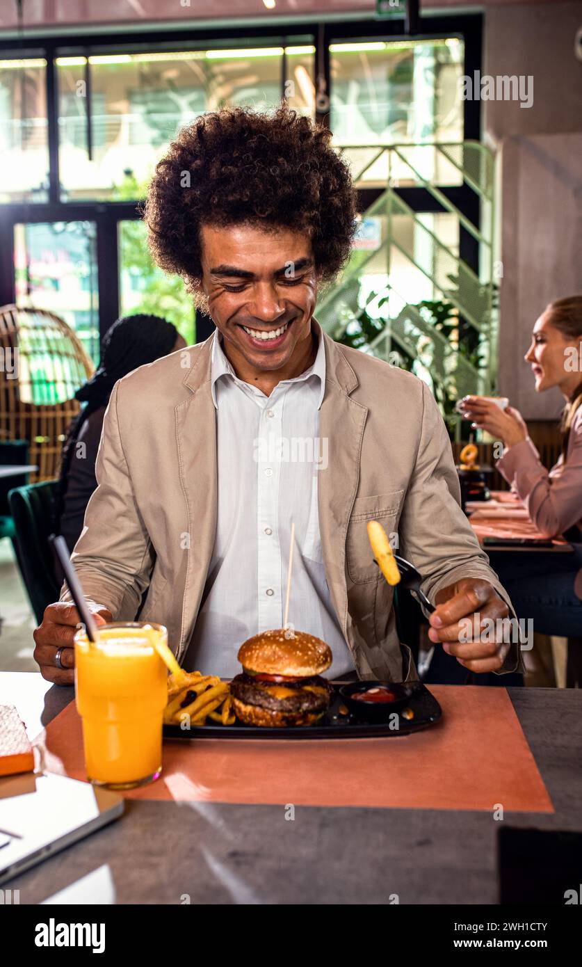 African american businessman eating hi-res stock photography and images ...