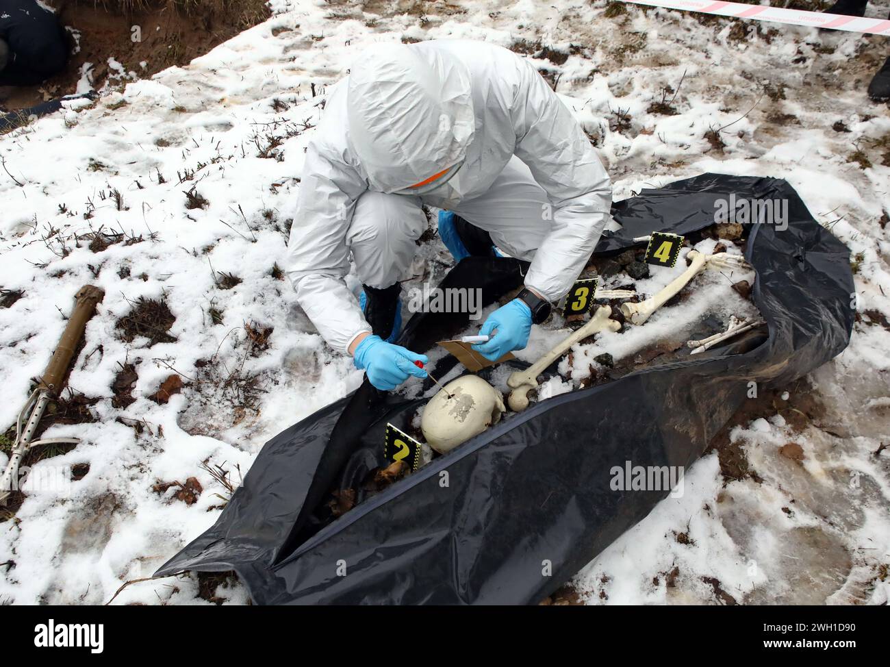 KYIV REGION, UKRAINE - FEBRUARY 6, 2024 - A forensic expert ...