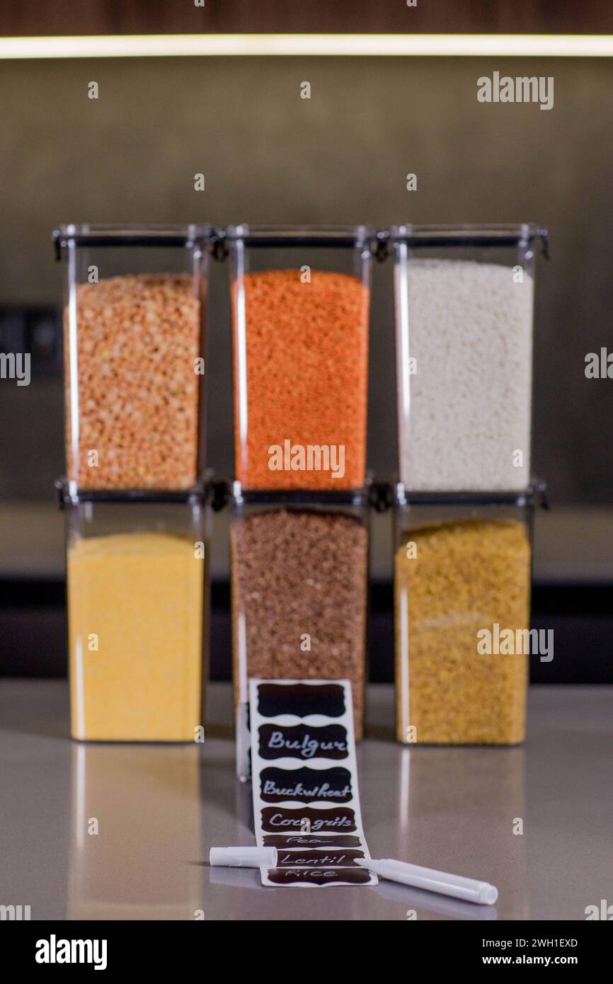 Kitchen storage organization use plastic case. Placing and sorting food ...