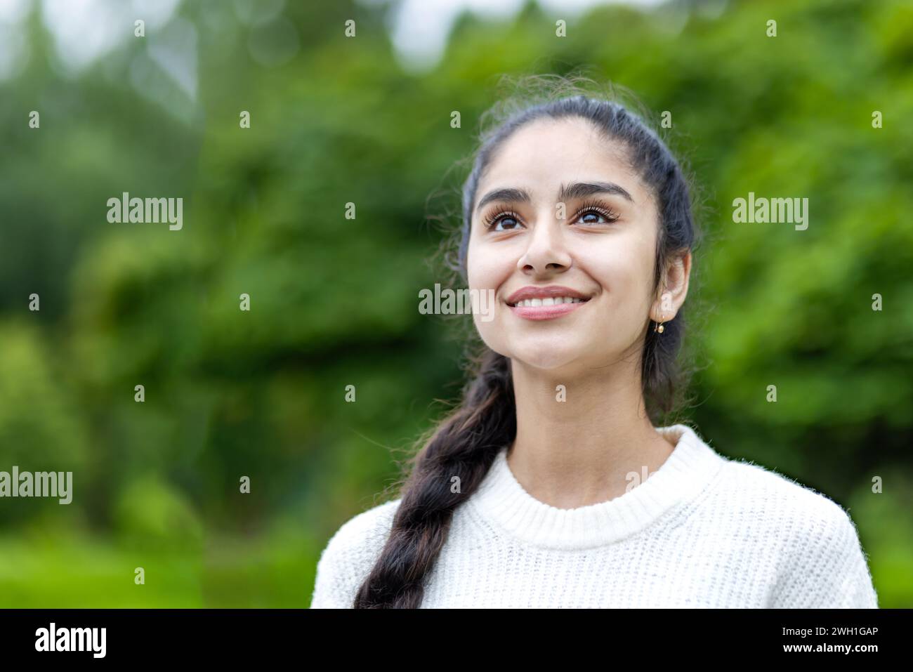 A cheerful Indian woman touring the city, expressing satisfaction and ...