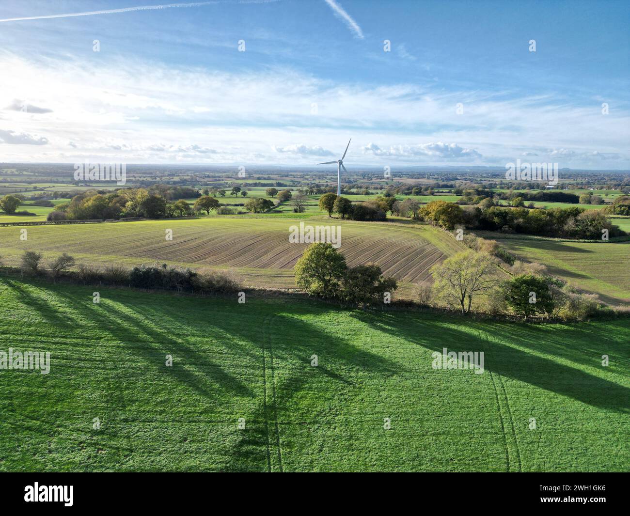 An aerial view of a wind turbine in the beautiful British countryside ...