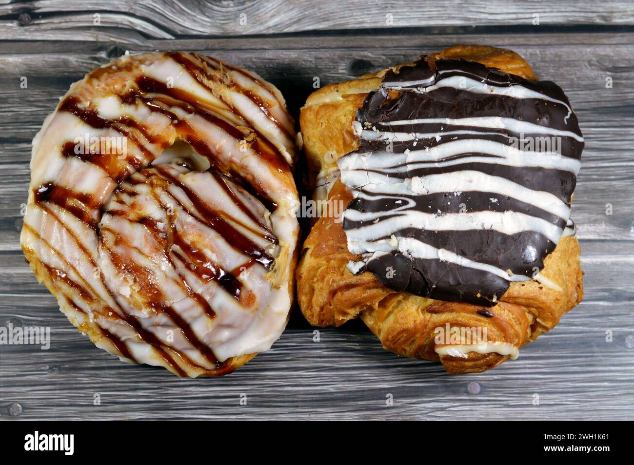 Danish pastry stuffed and topped with brown dark chocolate, white ...
