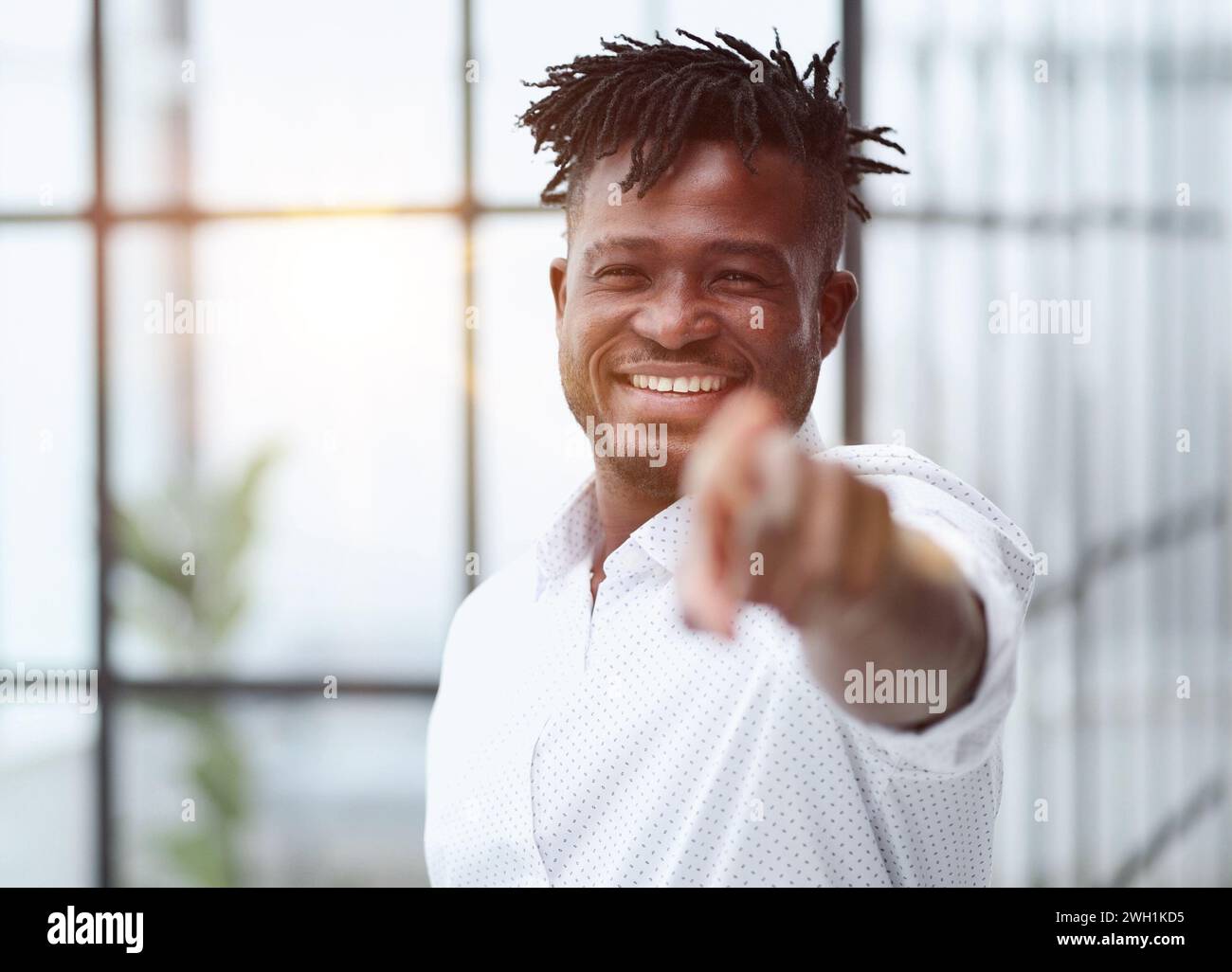 Adult man pointing camera inviting hi-res stock photography and images ...