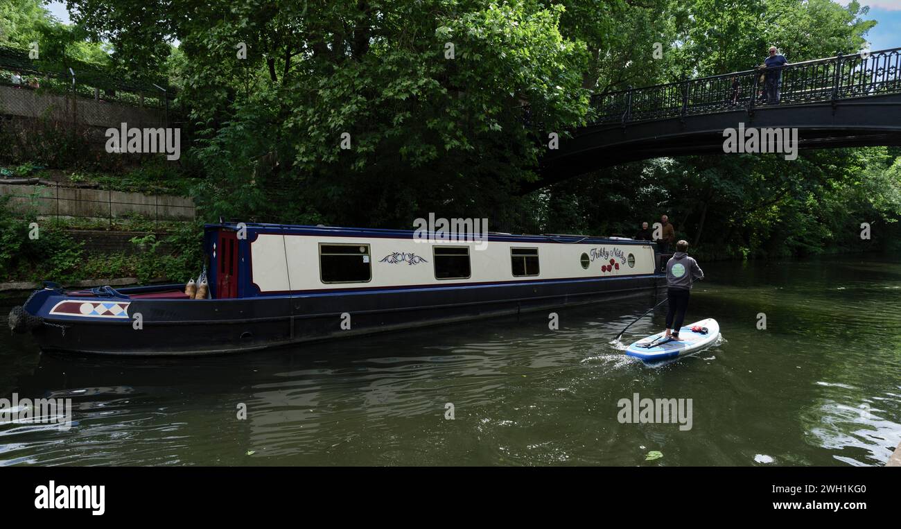 London - 29 05 2022: Boats and paddleboarding sailing along the Regent ...