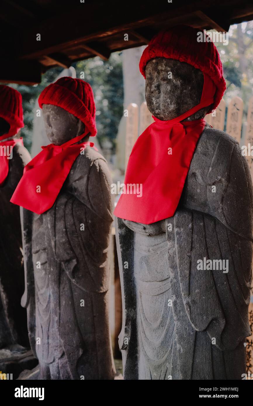 Red hoods, jizo, shrine, Tokyo, Japan, Gotojuki cemetery Stock Photo ...