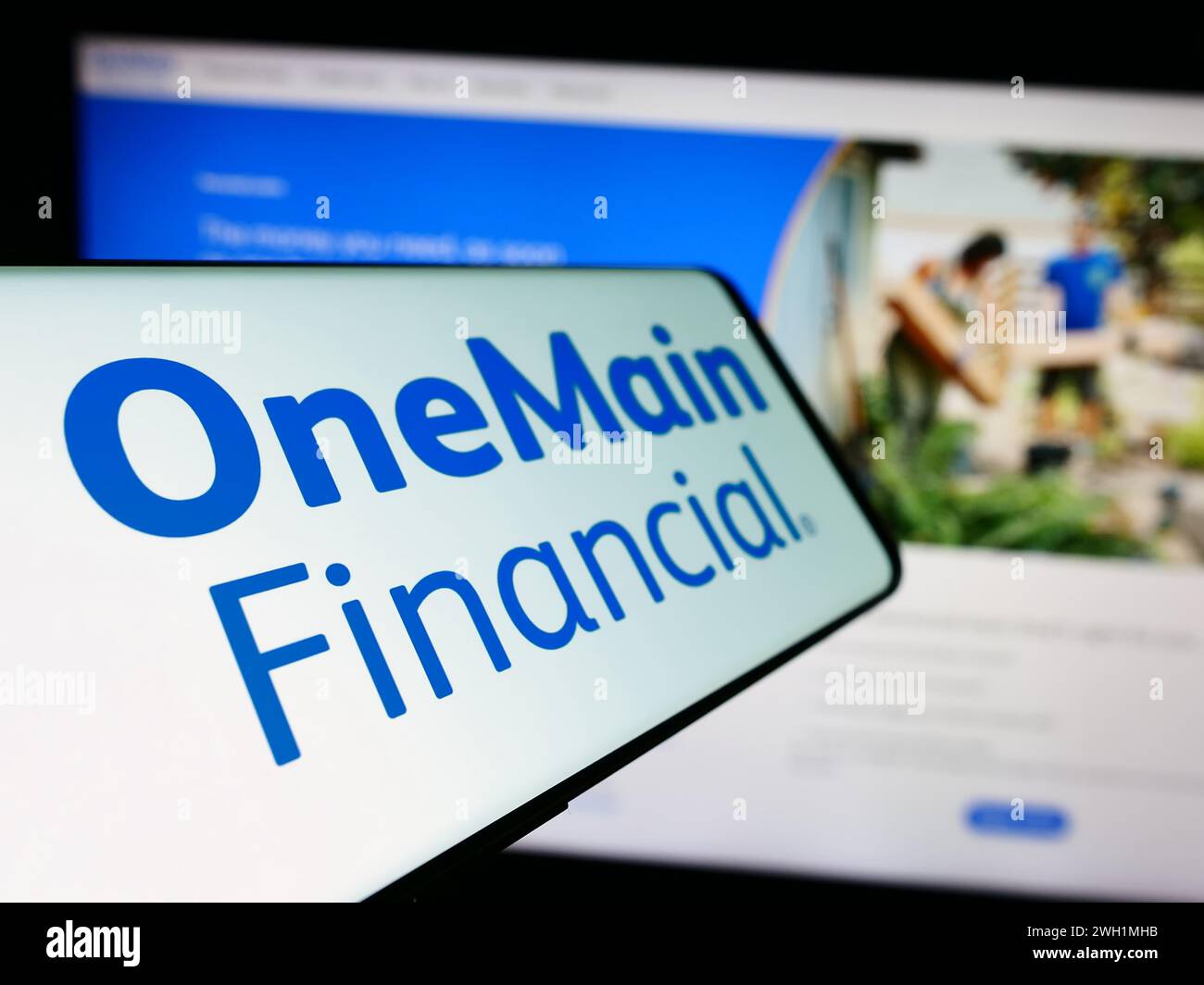Cellphone with logo of American financial services company OneMain ...