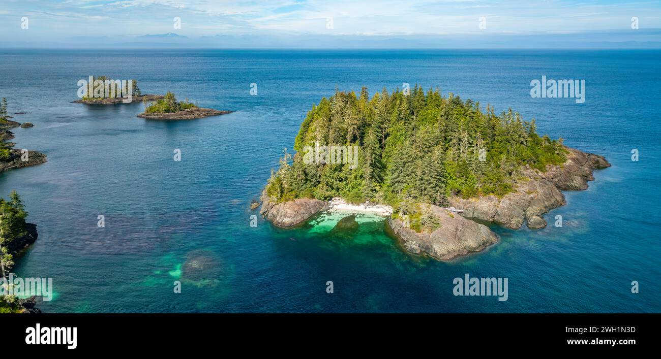 An aerial view of a tree-covered island in the sea Stock Photo - Alamy
