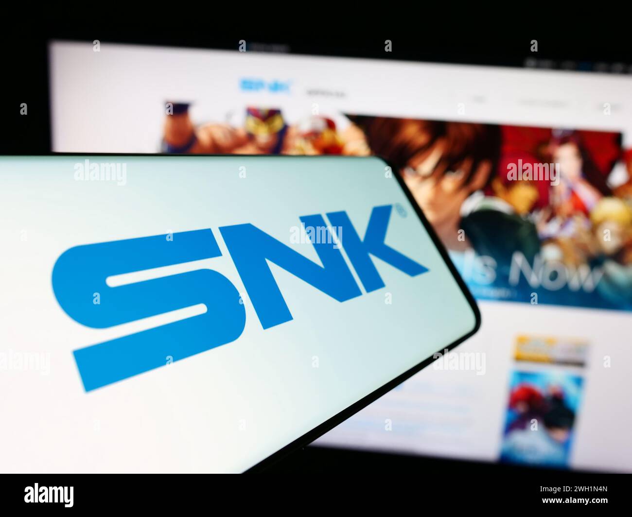 Smartphone with logo of Japanese video games company SNK Corporation in ...