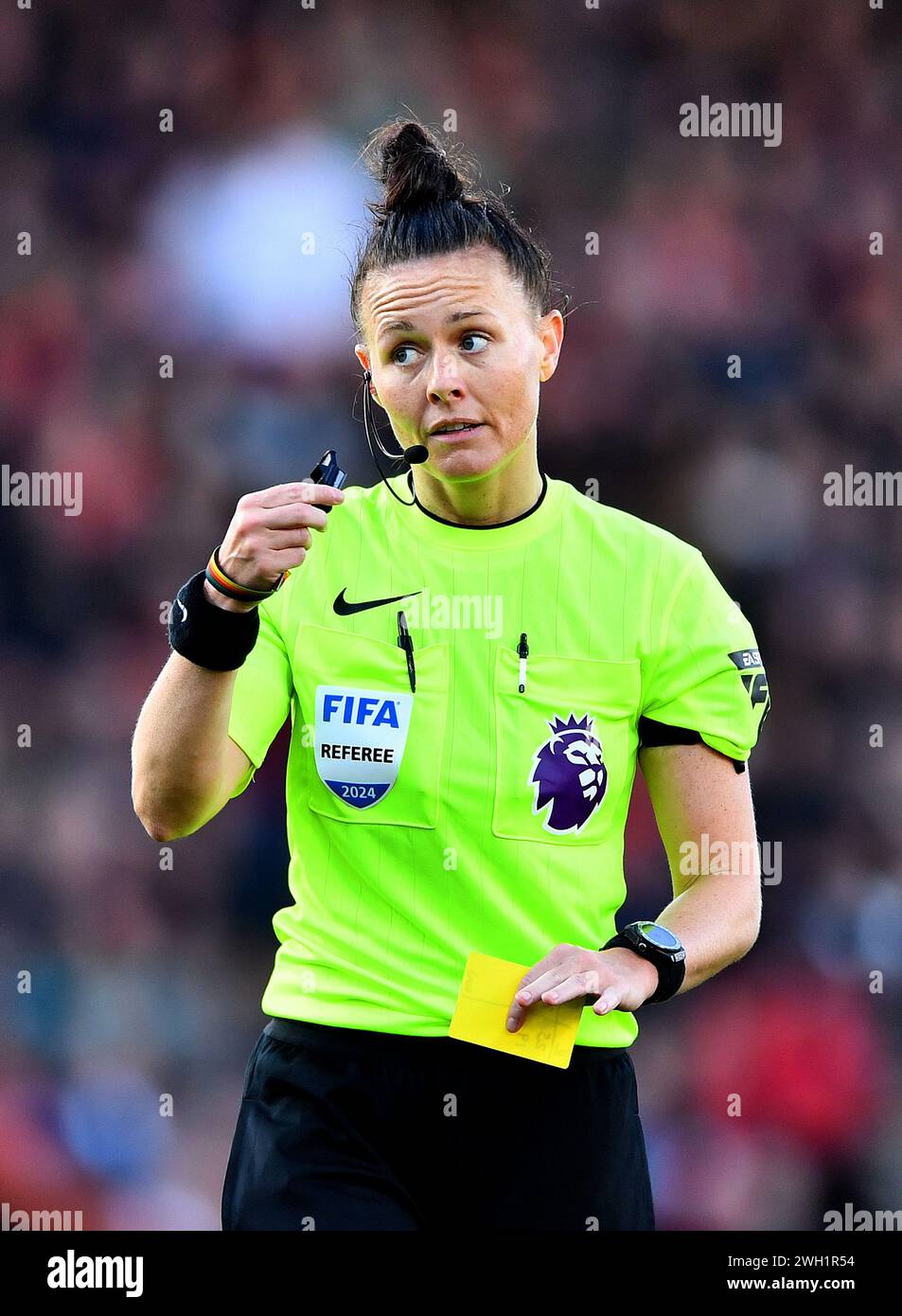 Referee Rebecca Welch holds her whistle and a yellow card - AFC ...