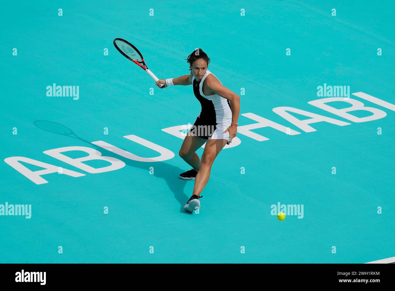 Daria Kasatkina returns the ball to Ashlyn Krueger of the U.S. during a ...