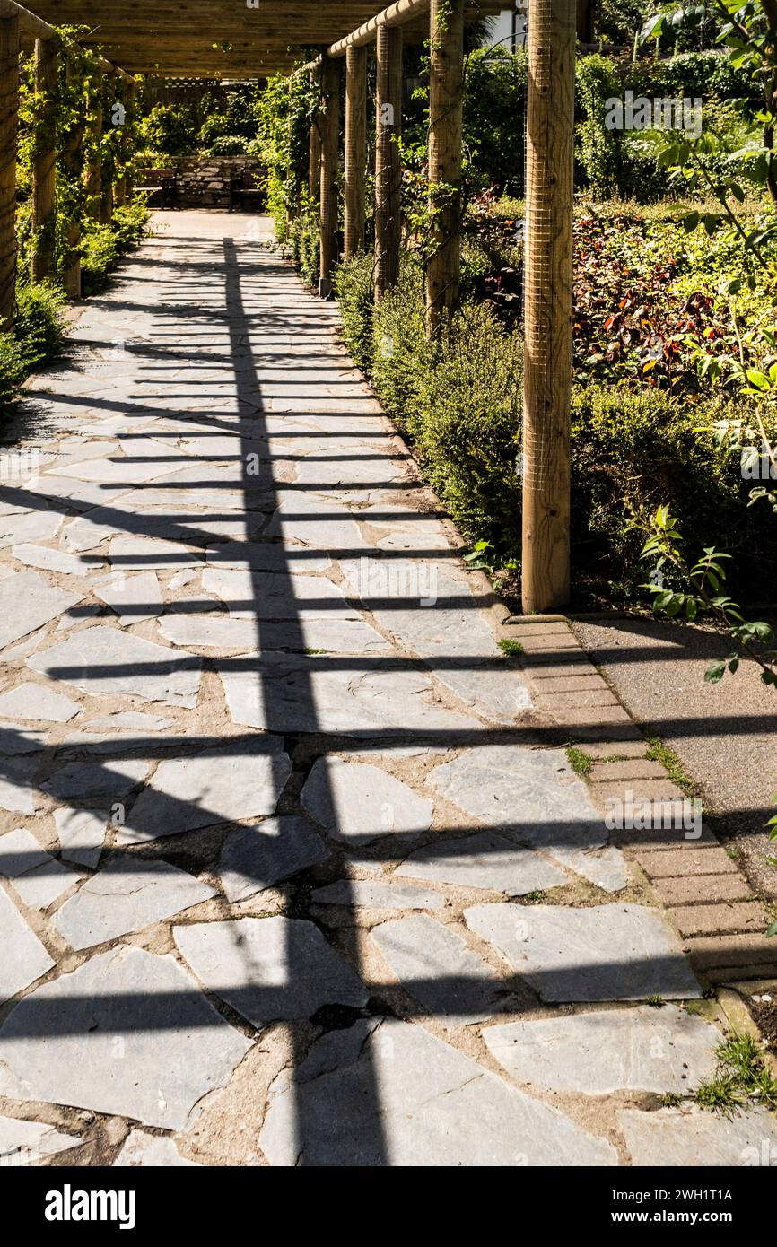 Shadows cast by a woodn walkway in the Trenance Rose Garden in Newquay ...
